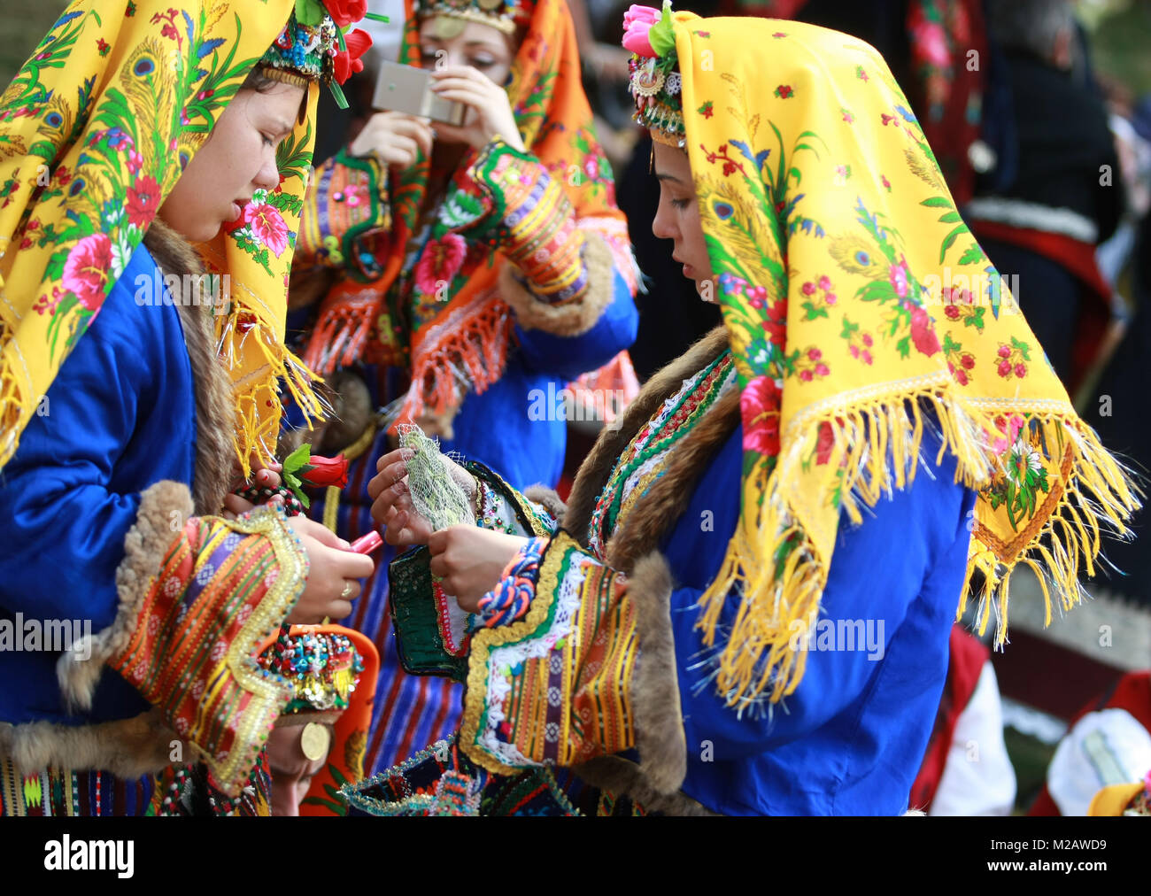People in traditional folk costume of The National Folklore Fair in ...