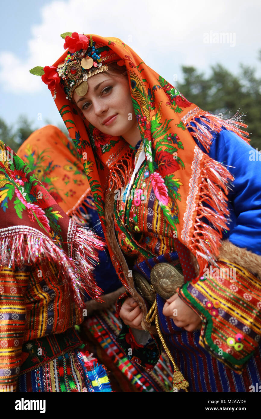 People in traditional folk costume of The National Folklore Fair in ...