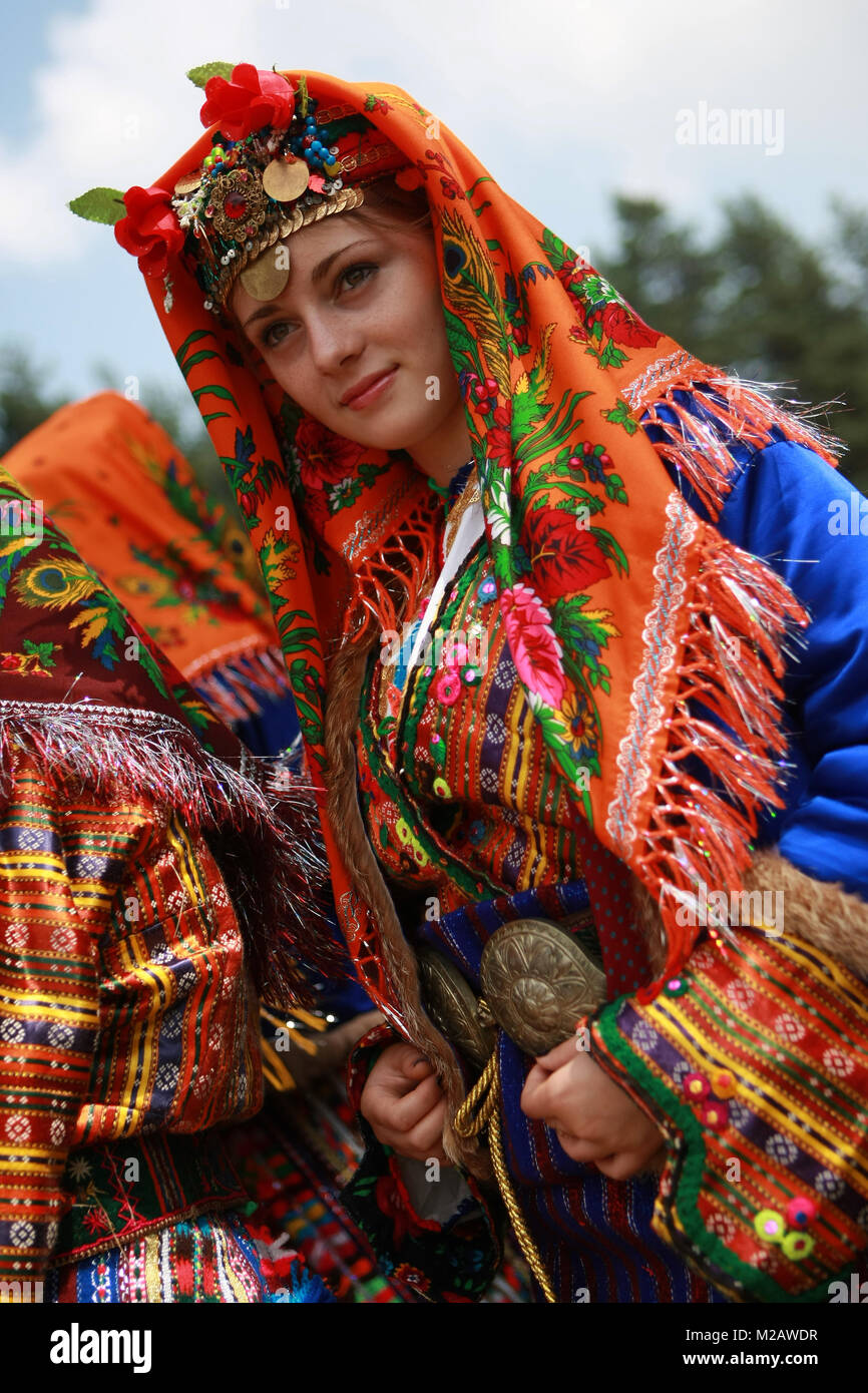 People in traditional folk costume of The National Folklore Fair in ...