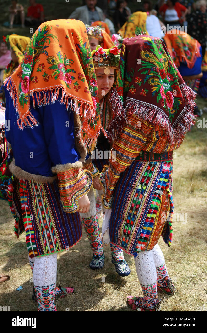 People in traditional folk costume of The National Folklore Fair in ...