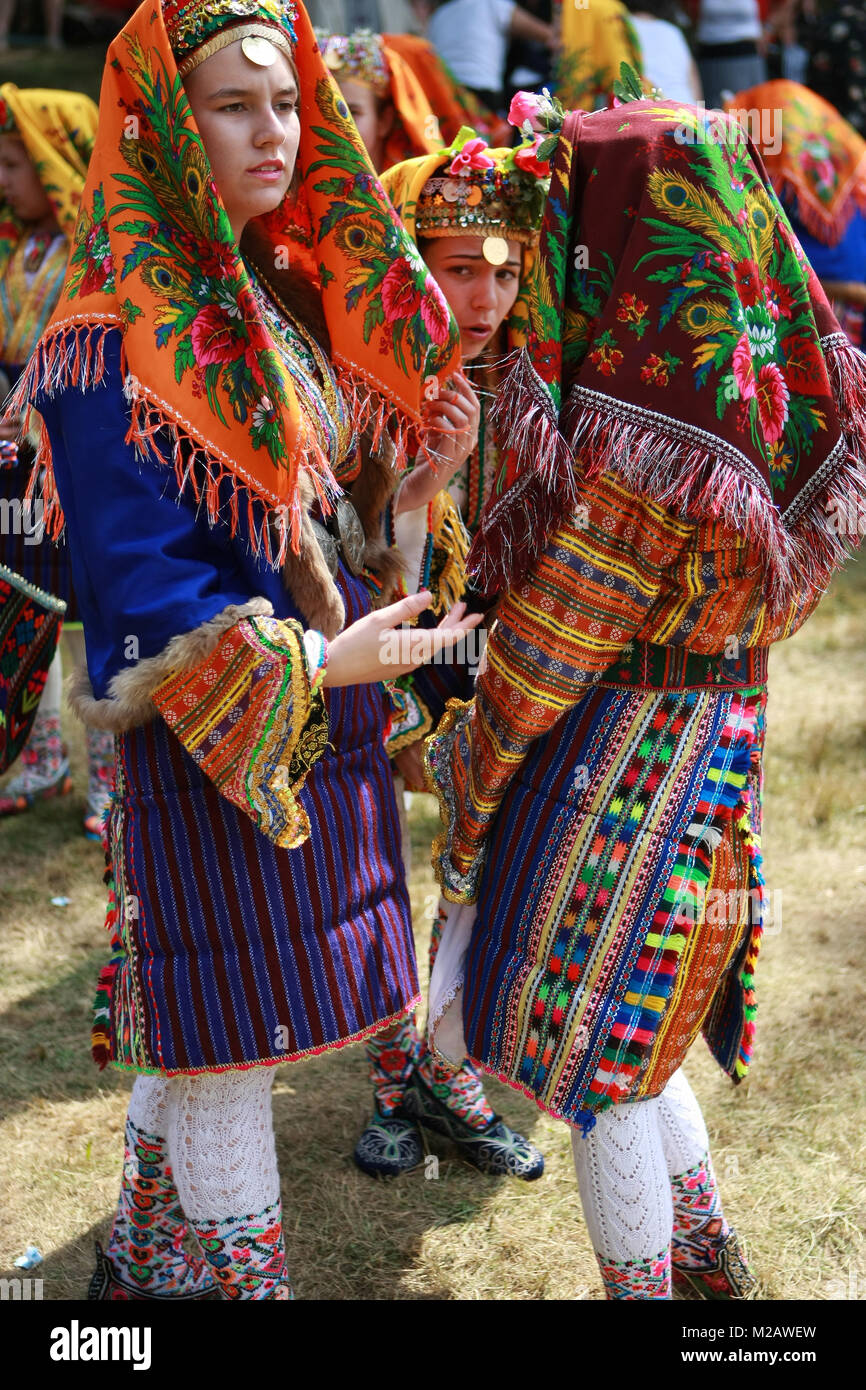 People in traditional folk costume of The National Folklore Fair in ...