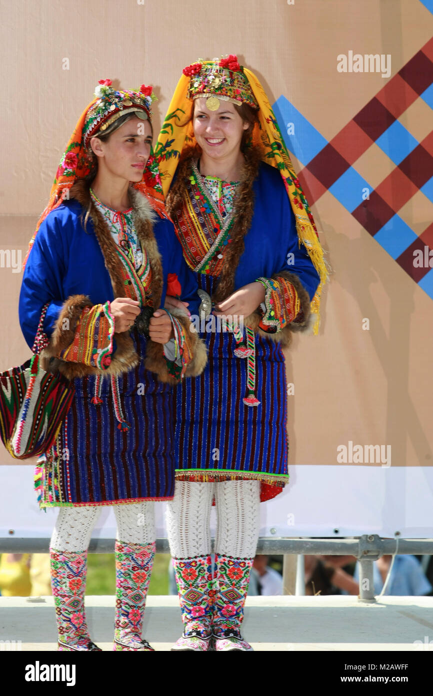 People in traditional folk costume of The National Folklore Fair in ...