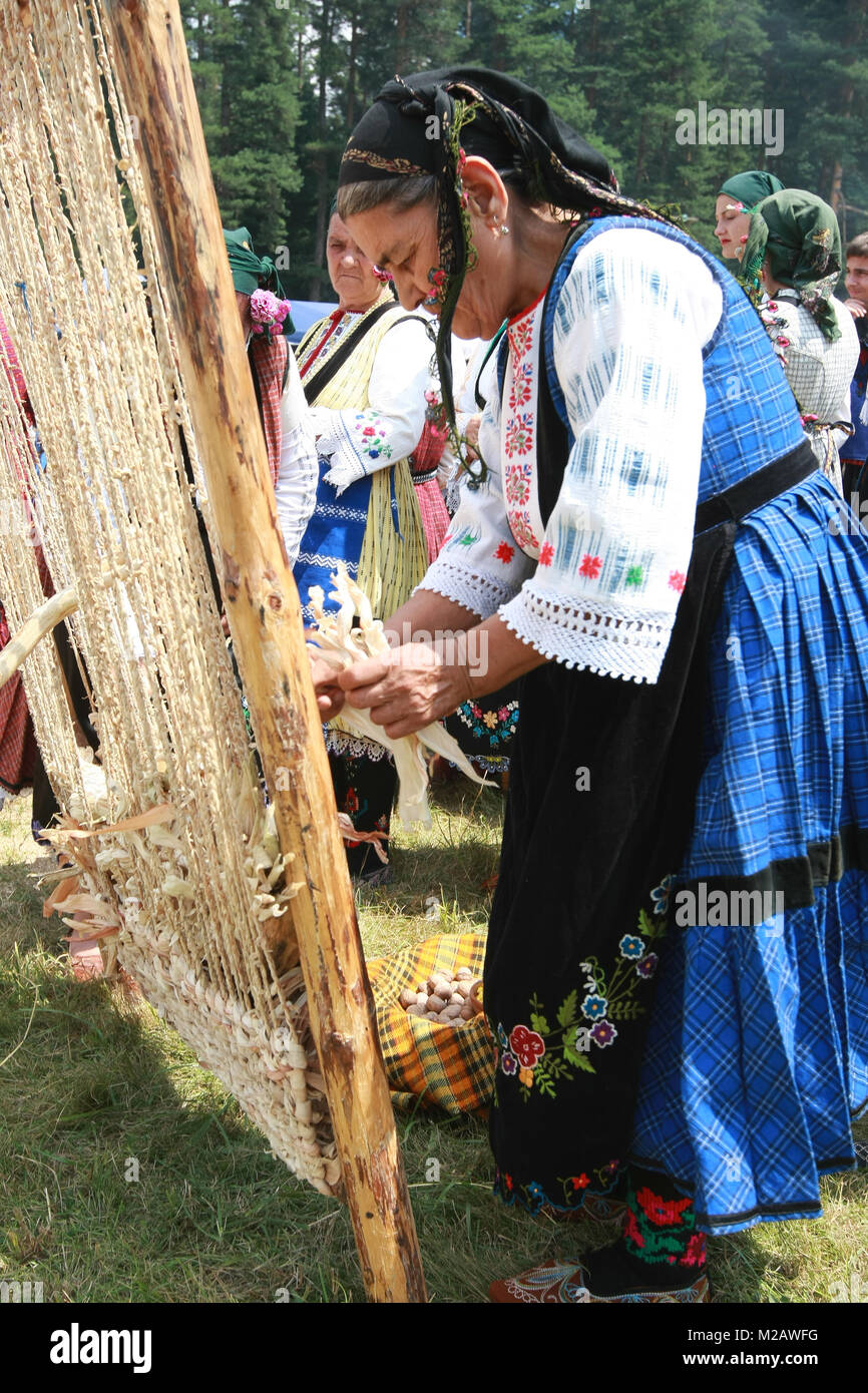 People in traditional folk costume of The National Folklore Fair in ...