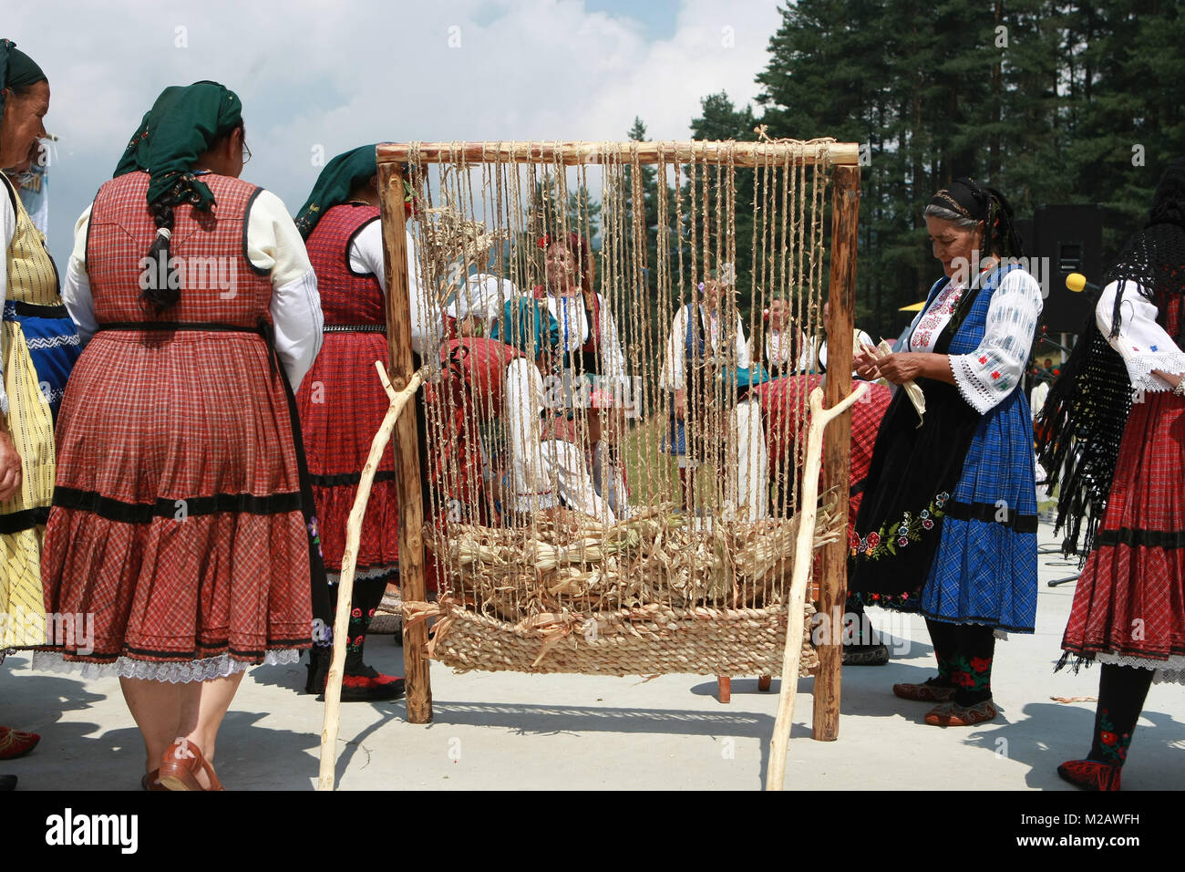 People in traditional folk costume of The National Folklore Fair in ...
