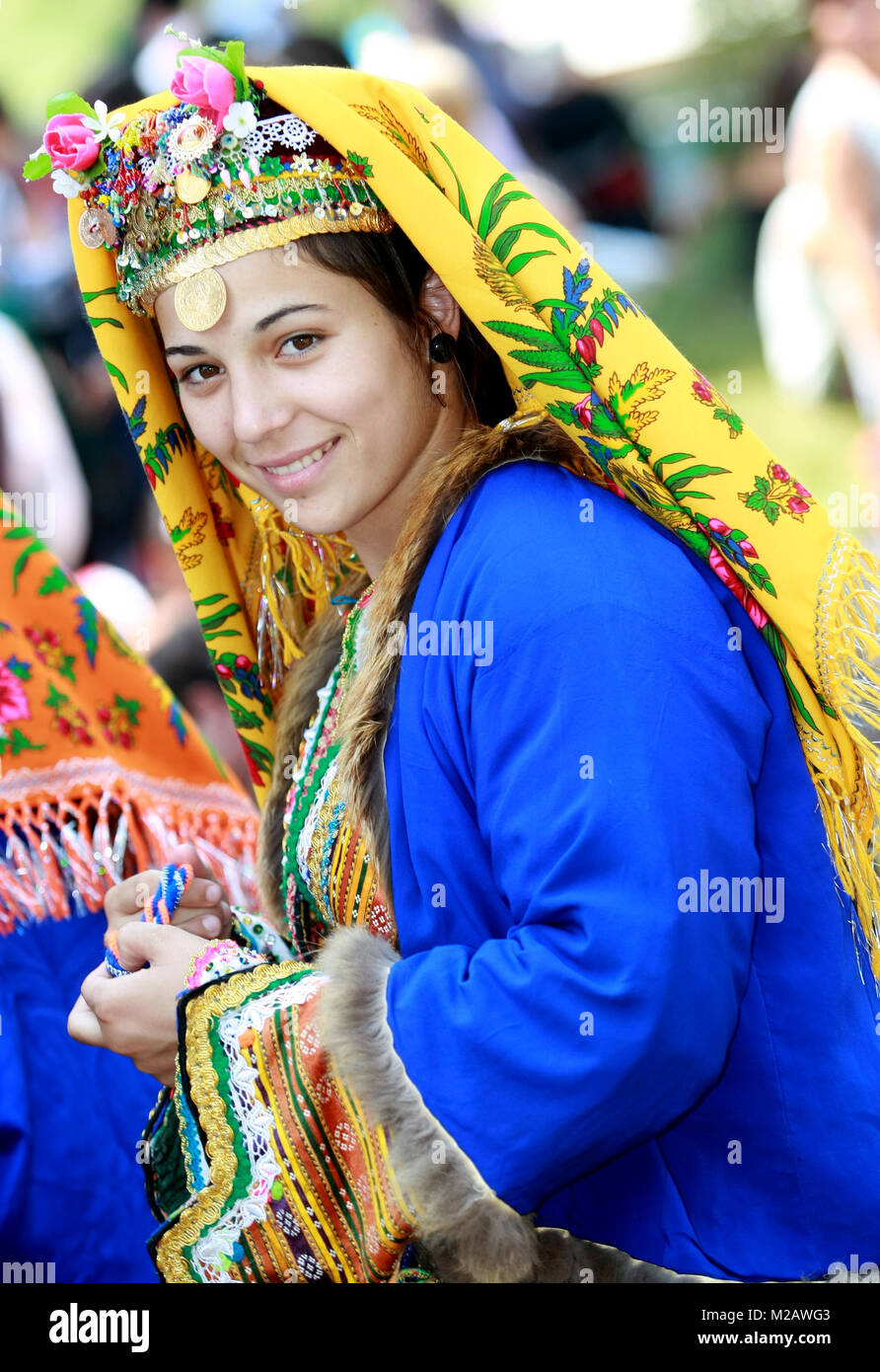 People in traditional folk costume of The National Folklore Fair in ...