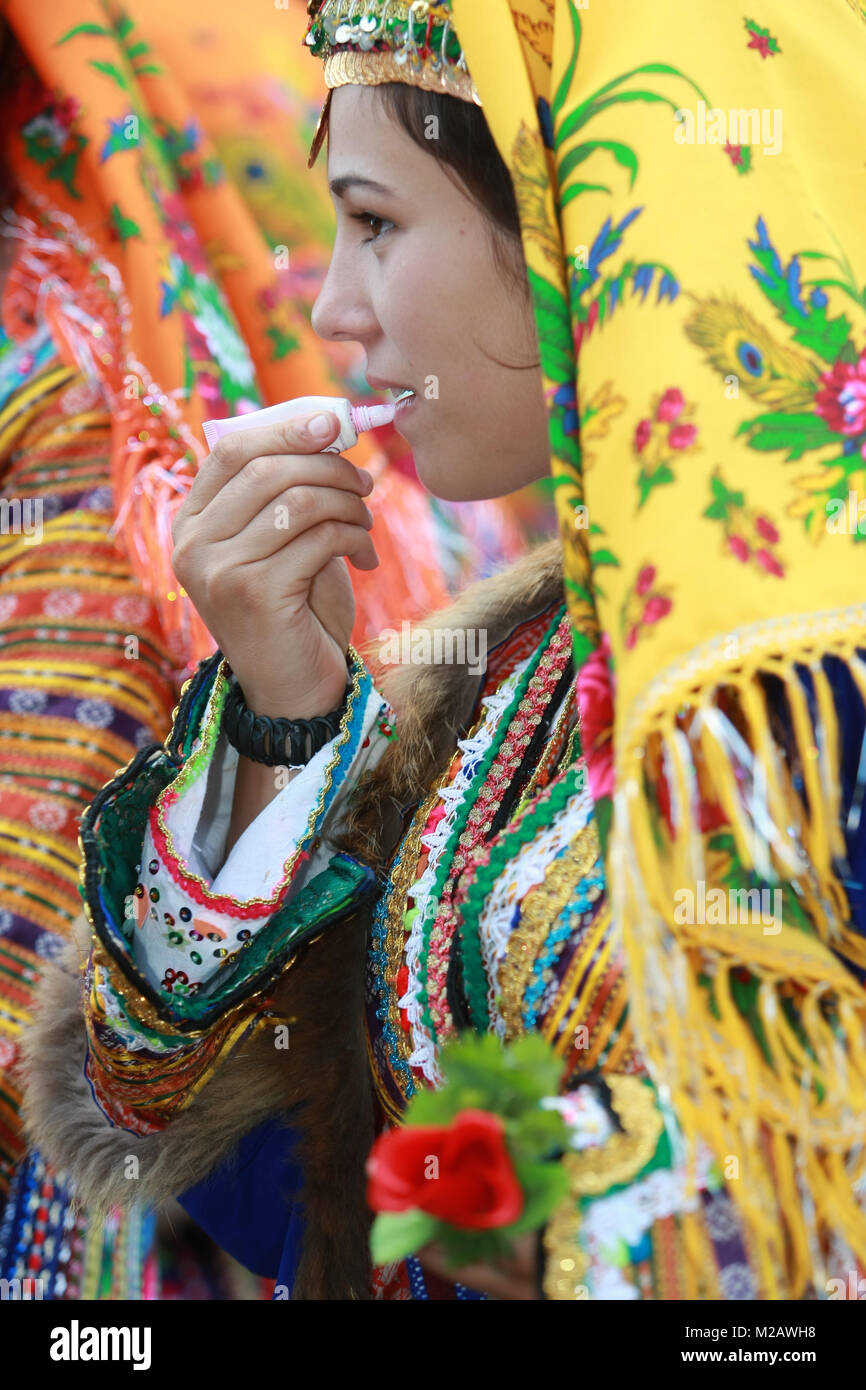 People in traditional folk costume of The National Folklore Fair in ...