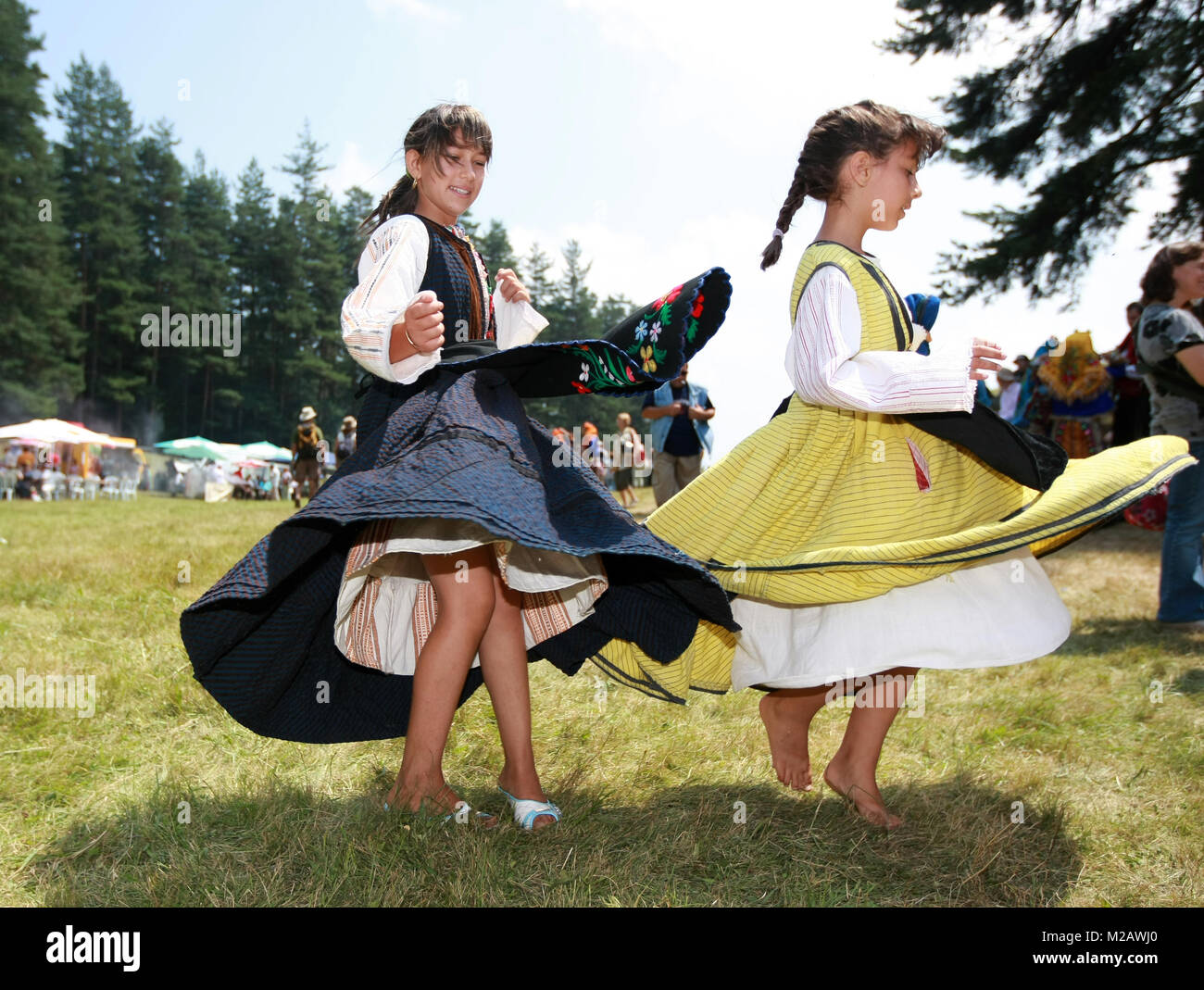 People in traditional folk costume of The National Folklore Fair in ...