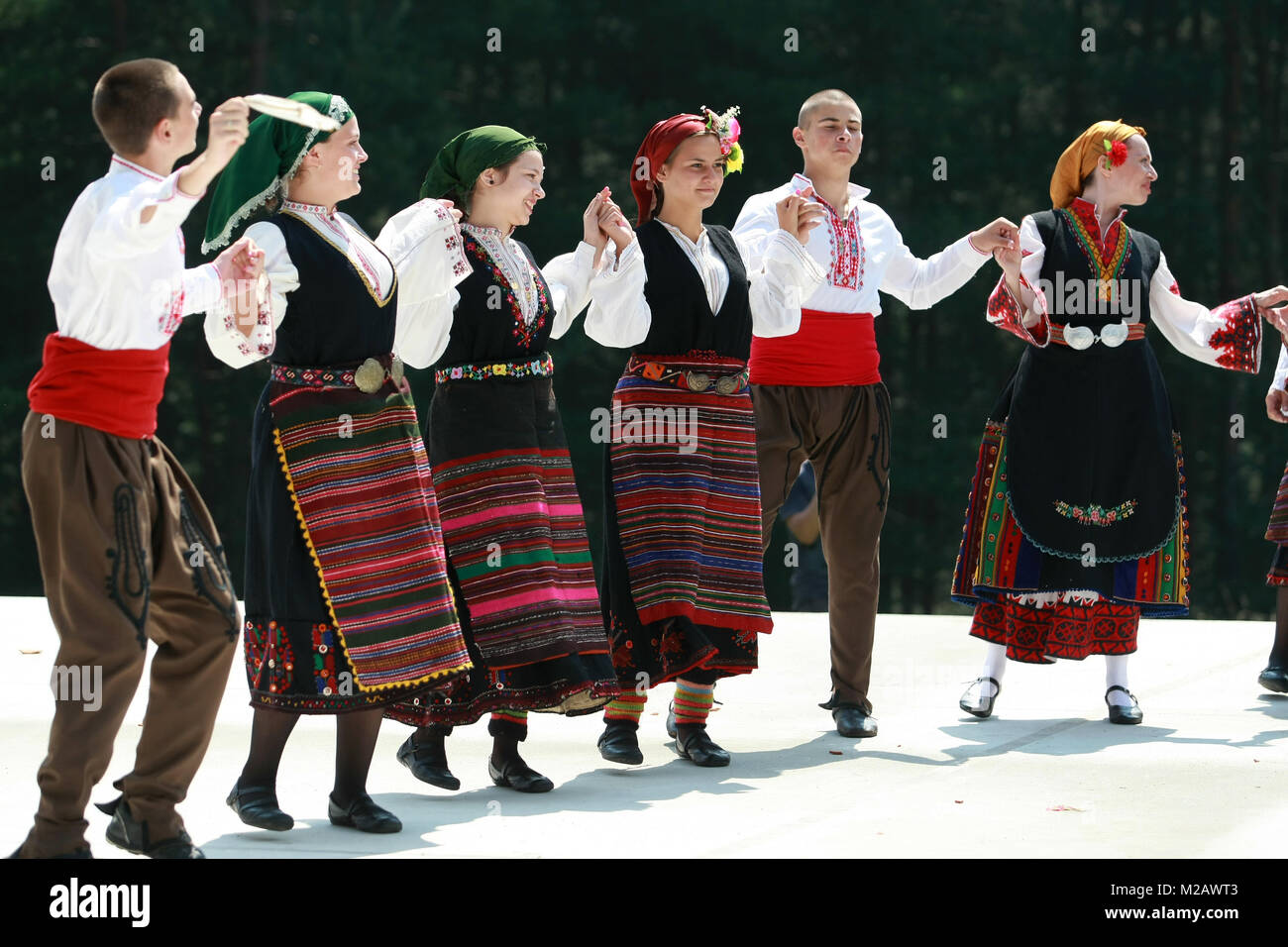 People in traditional folk costume of The National Folklore Fair in ...
