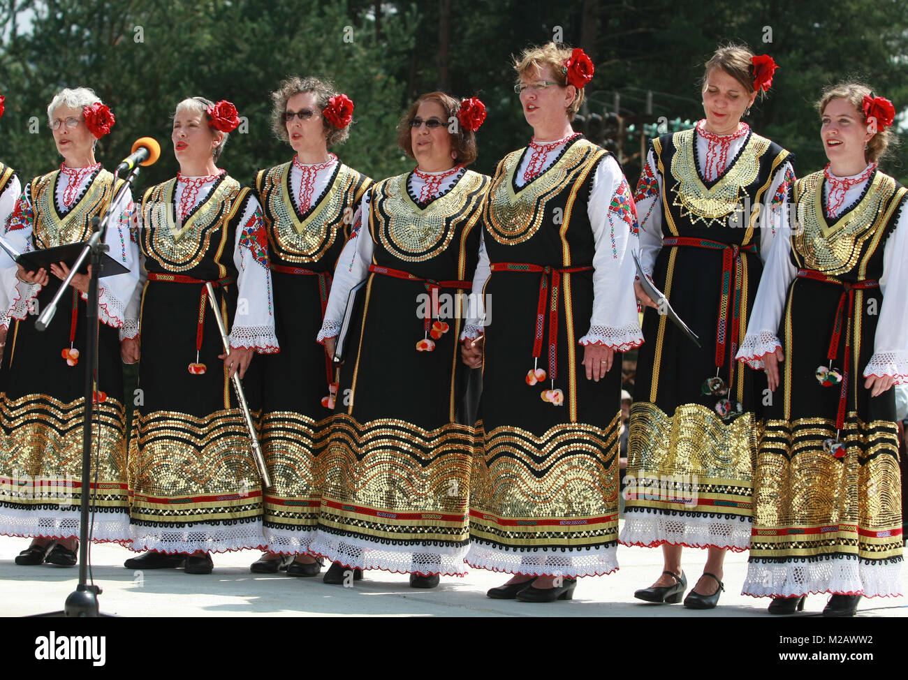 People in traditional folk costume of The National Folklore Fair in ...