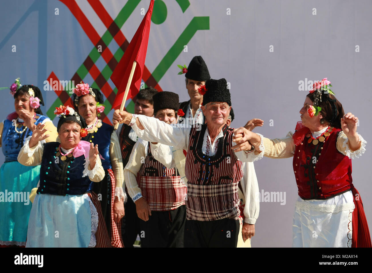 People in traditional folk costume of The National Folklore Fair in ...