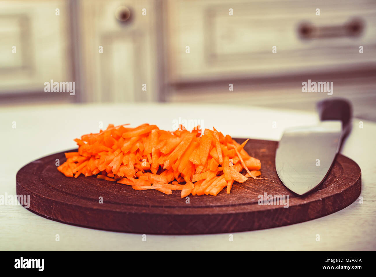 Fresh carrot vegetable cut knife hi-res stock photography and images ...
