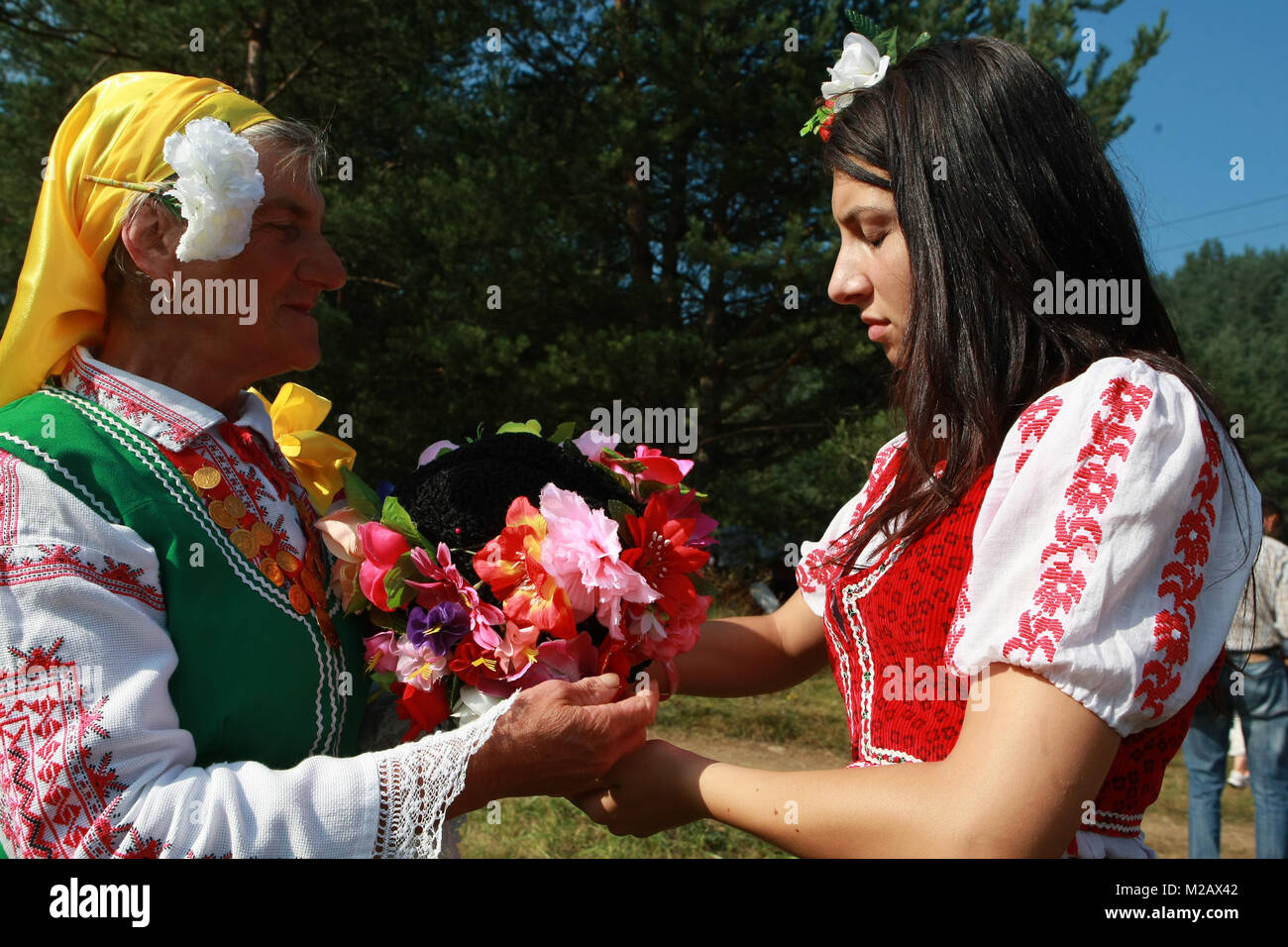 People in traditional folk costume of The National Folklore Fair in ...