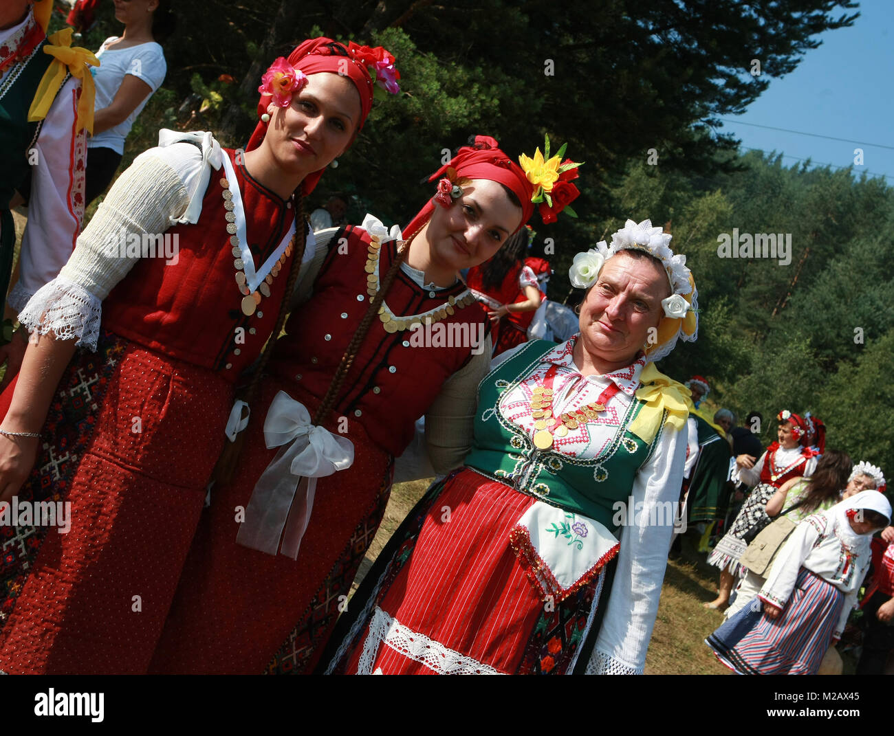 People in traditional folk costume of The National Folklore Fair in ...