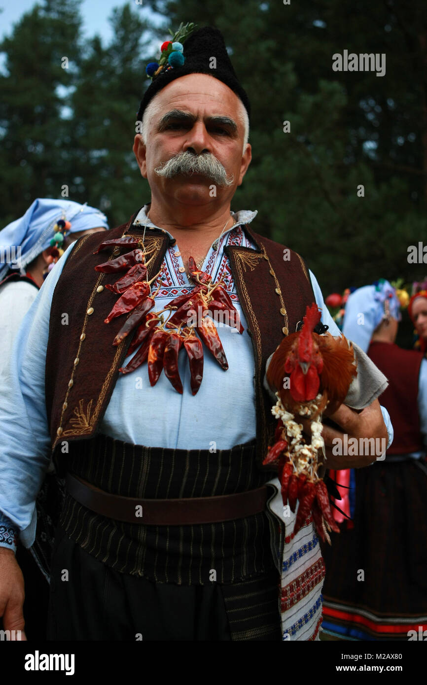 People in traditional folk costume of The National Folklore Fair in ...