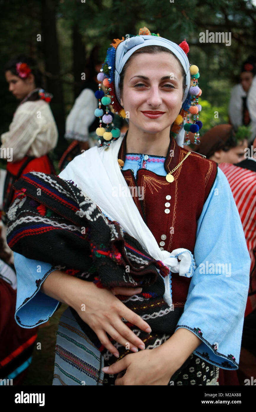 People in traditional folk costume of The National Folklore Fair in ...