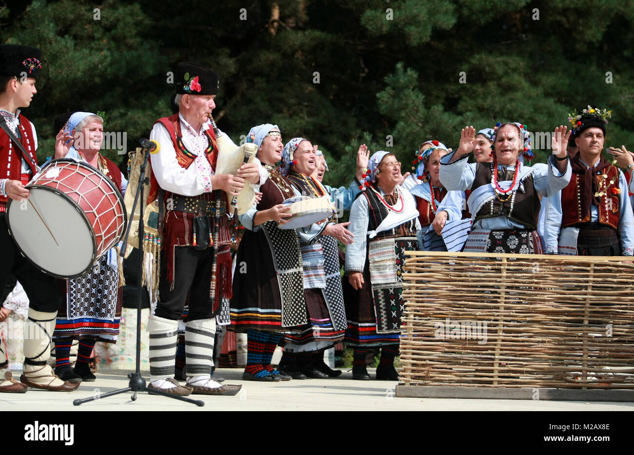 People in traditional folk costume of The National Folklore Fair in ...