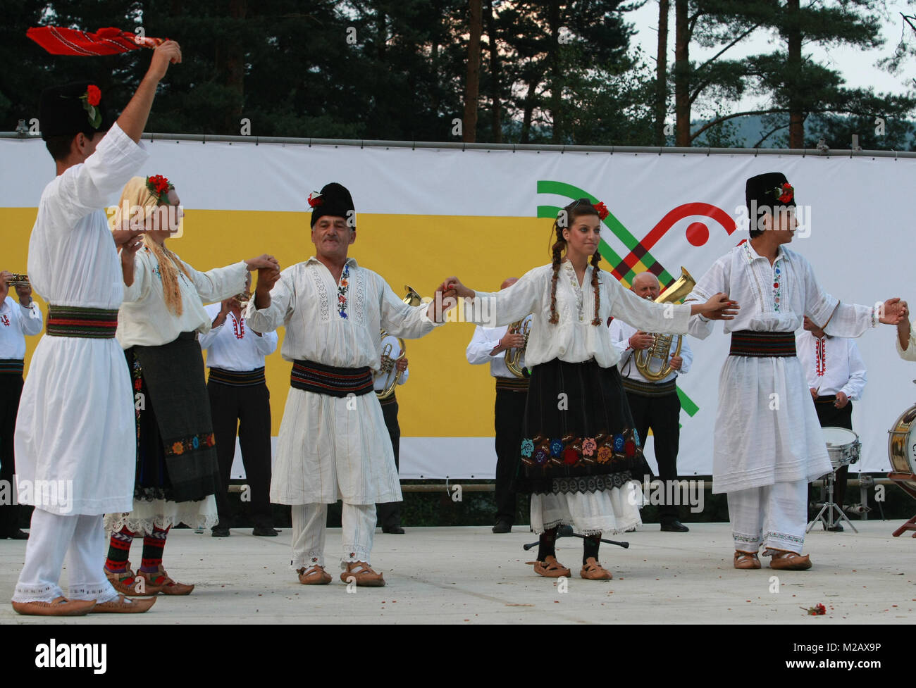 People in traditional folk costume of The National Folklore Fair in ...