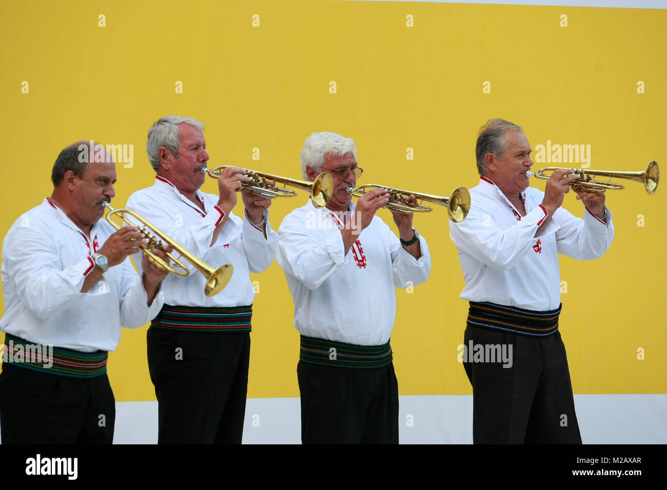 People in traditional folk costume of The National Folklore Fair in ...