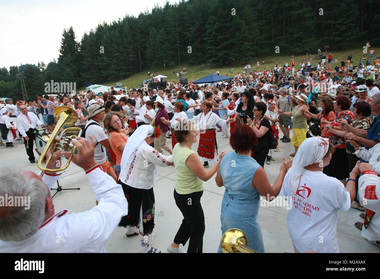 People in traditional folk costume of The National Folklore Fair in ...