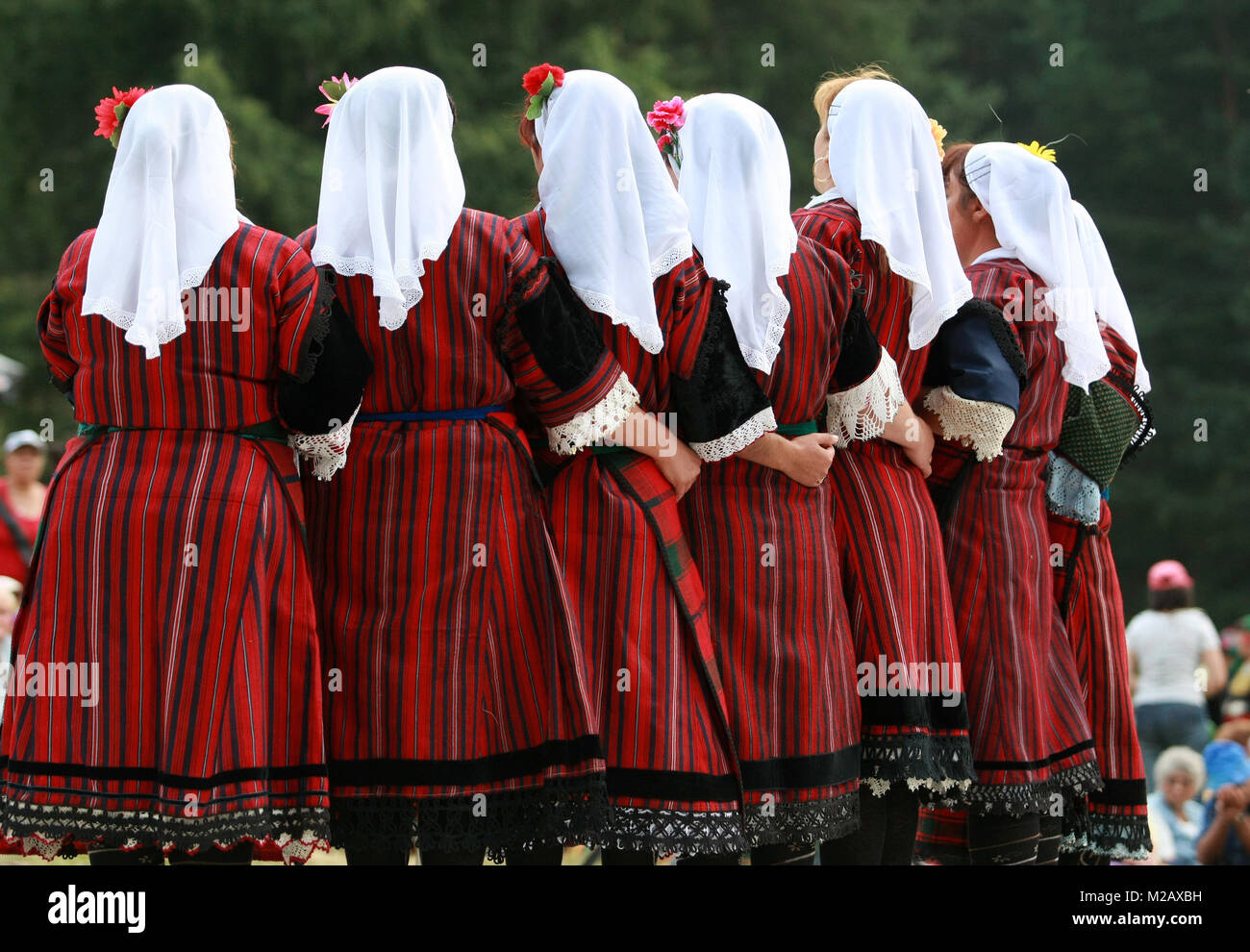 People in traditional folk costume of The National Folklore Fair in ...