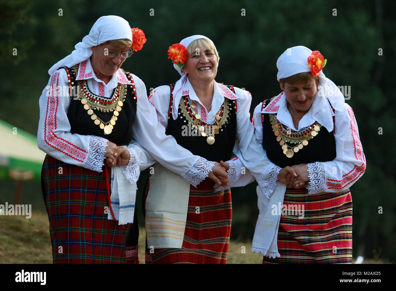 People in traditional folk costume of The National Folklore Fair in ...