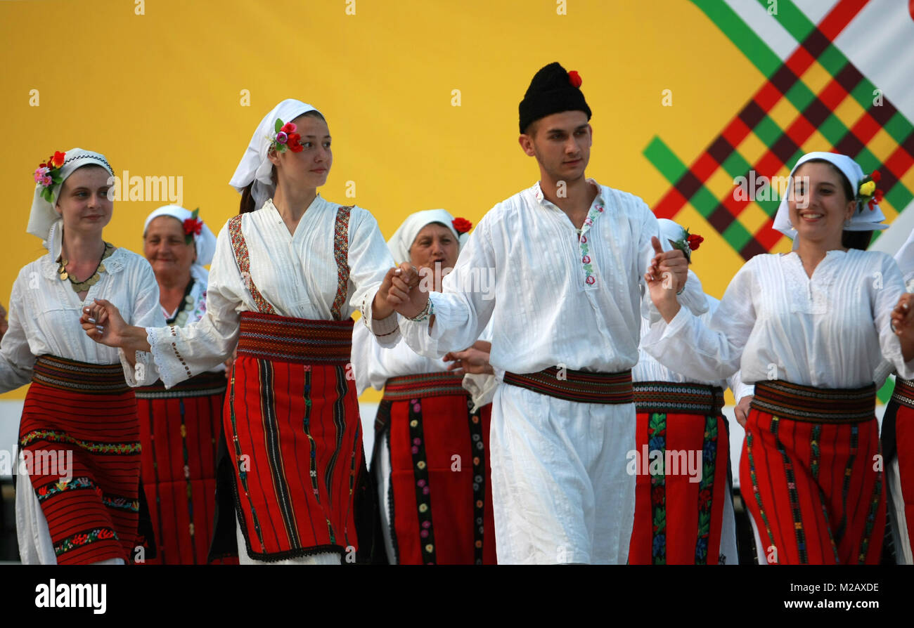 People in traditional folk costume of The National Folklore Fair in ...