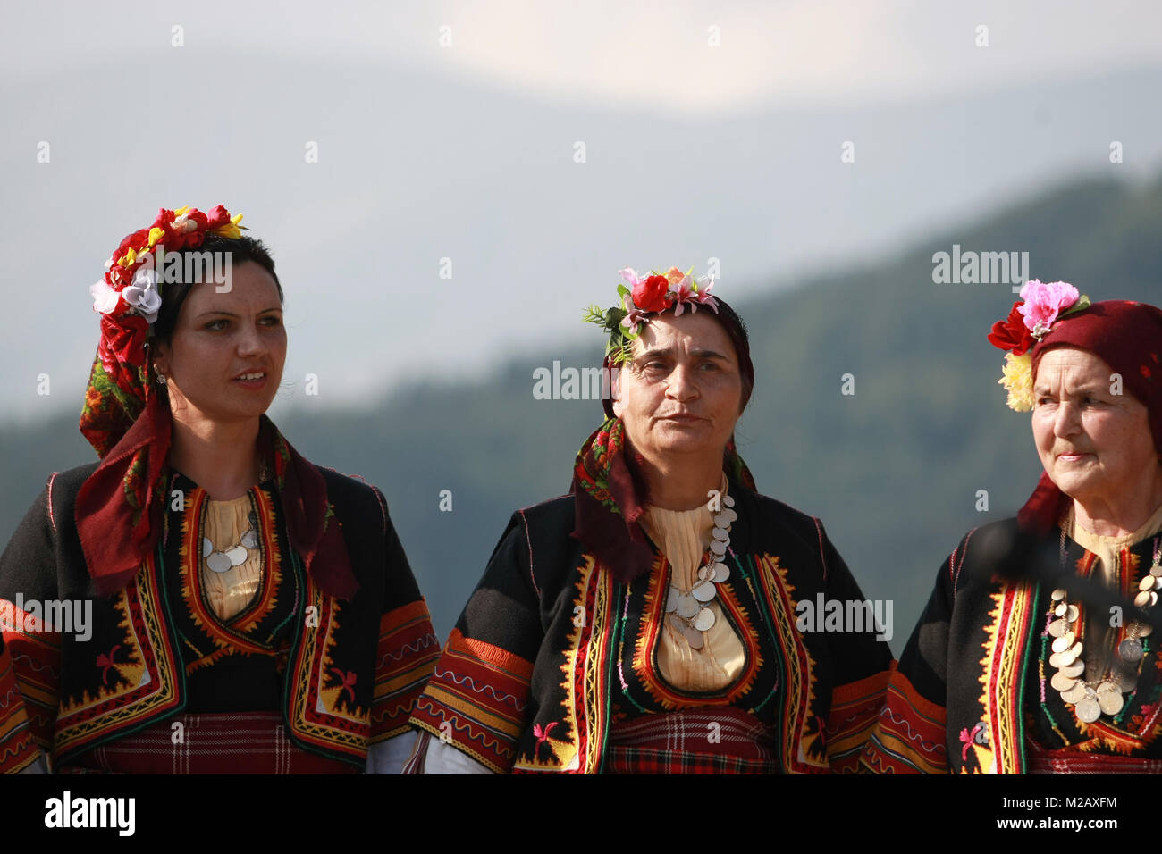 People in traditional folk costume of The National Folklore Fair in ...