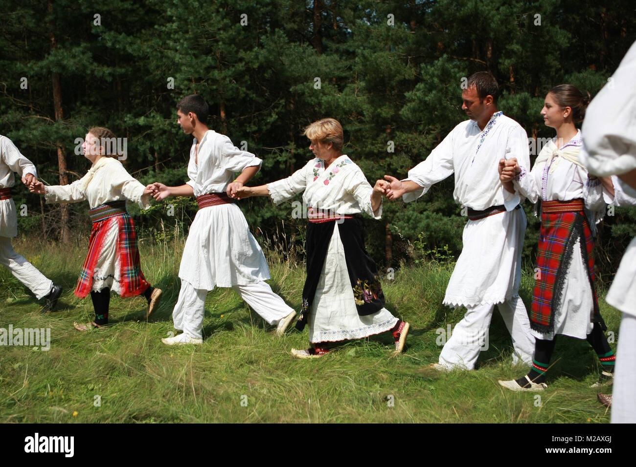 People in traditional folk costume of The National Folklore Fair in ...