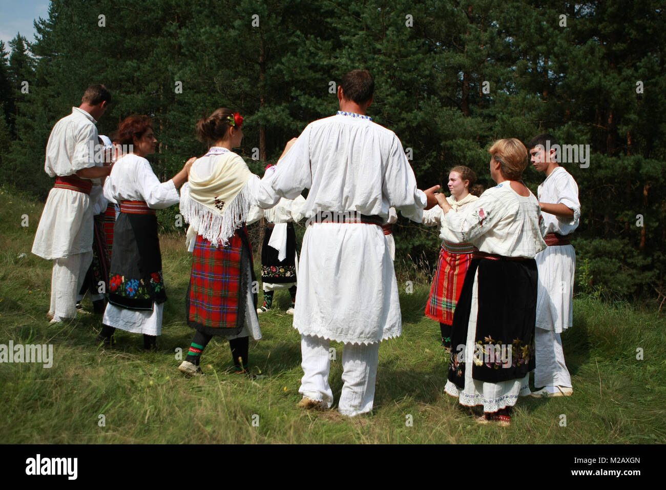 People in traditional folk costume of The National Folklore Fair in ...