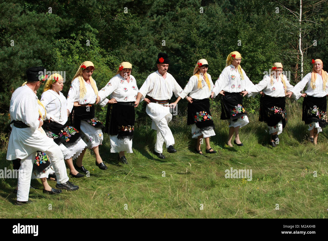 People in traditional folk costume of The National Folklore Fair in ...