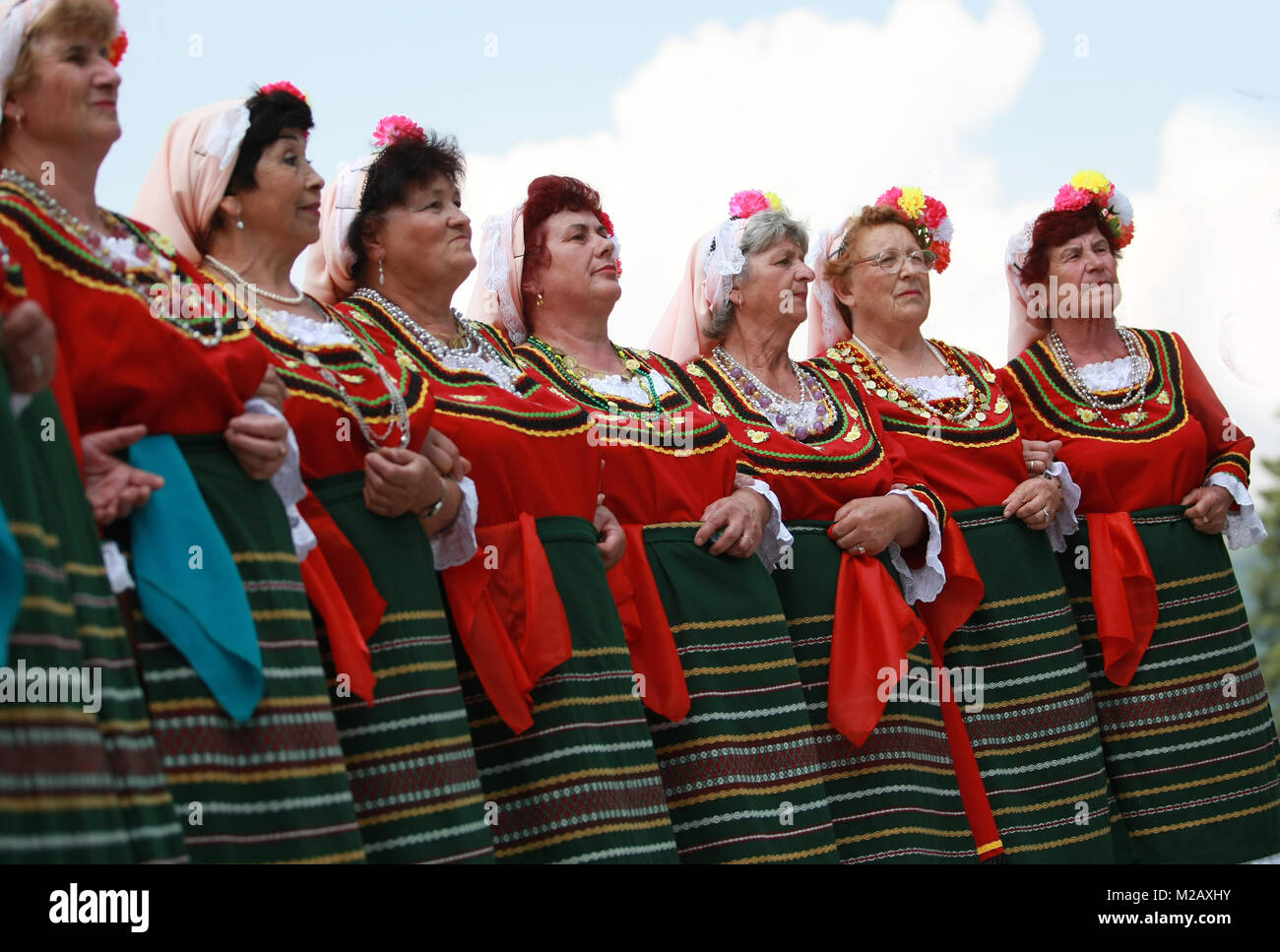 People in traditional folk costume of The National Folklore Fair in ...