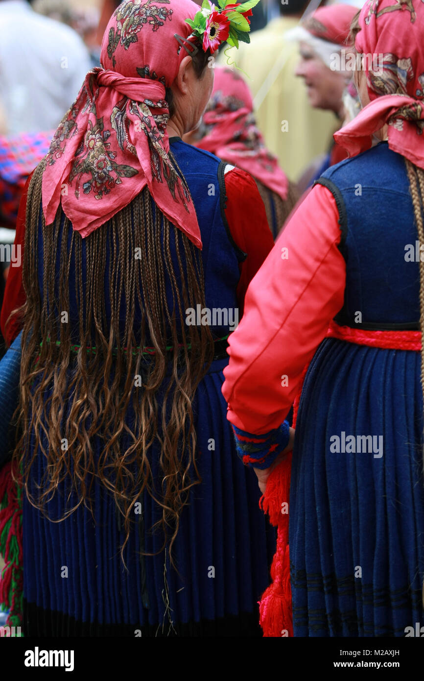 People in traditional folk costume of The National Folklore Fair in ...