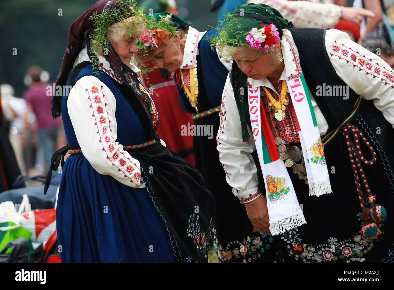 People in traditional folk costume of The National Folklore Fair in ...