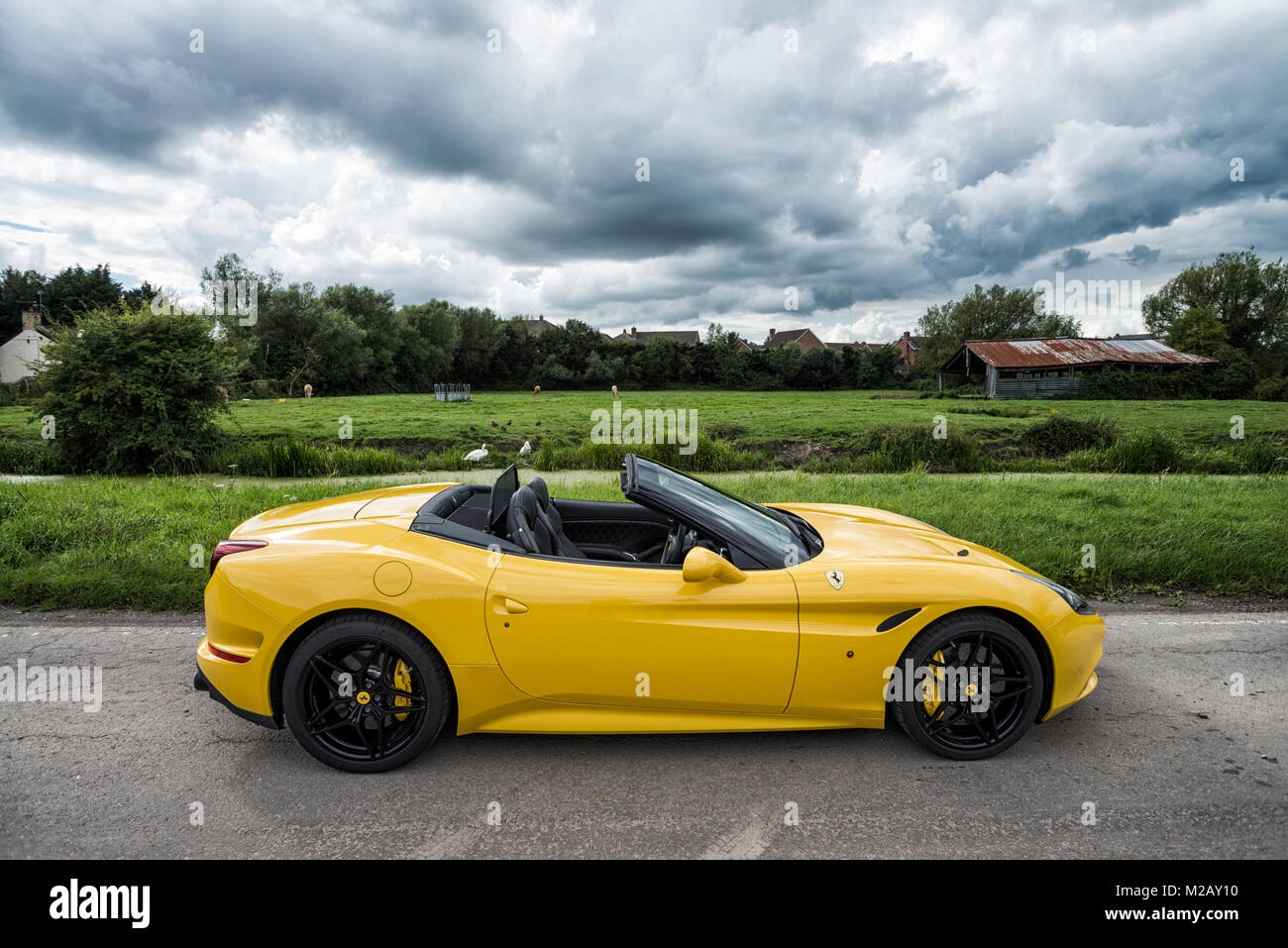 A yellow Ferrari F1 California pictured on The Gwent Levels between ...