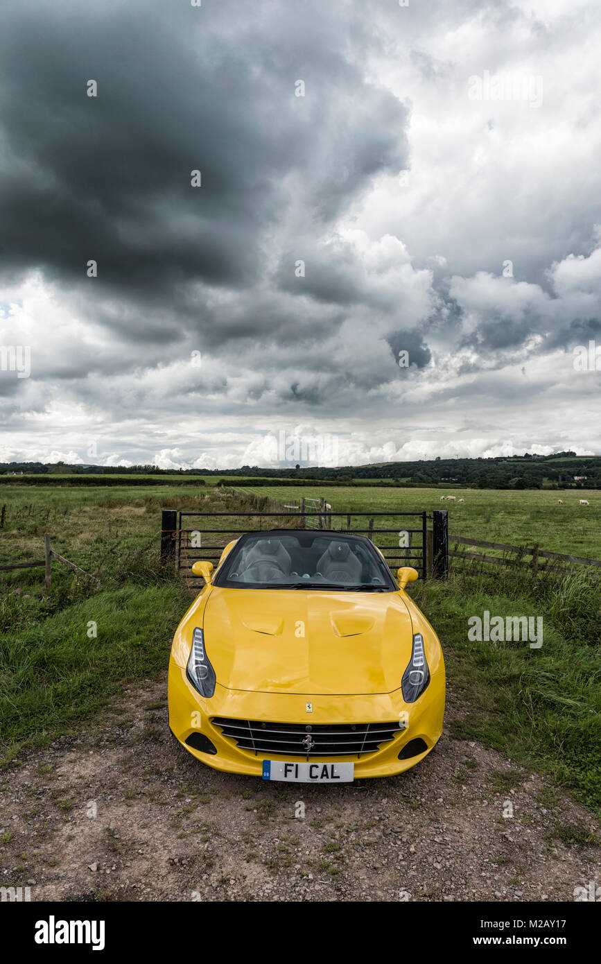A yellow Ferrari F1 California pictured on The Gwent Levels between ...