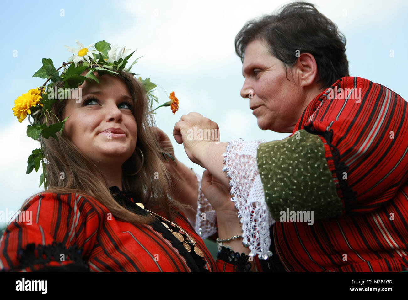 People in traditional folk costume of The National Folklore Fair in ...