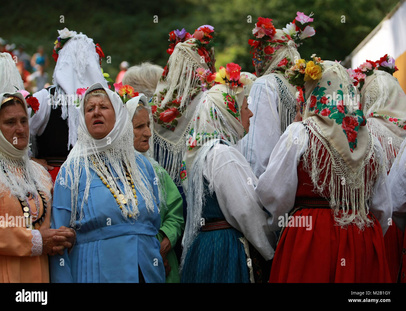 People in traditional folk costume of The National Folklore Fair in ...
