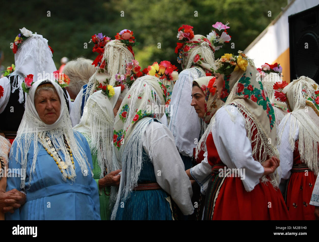 People in traditional folk costume of The National Folklore Fair in ...