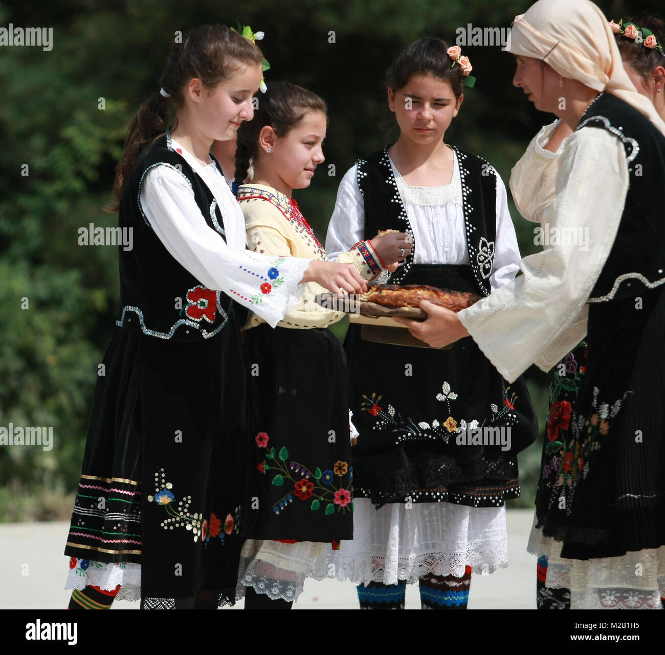 People in traditional folk costume of The National Folklore Fair in ...