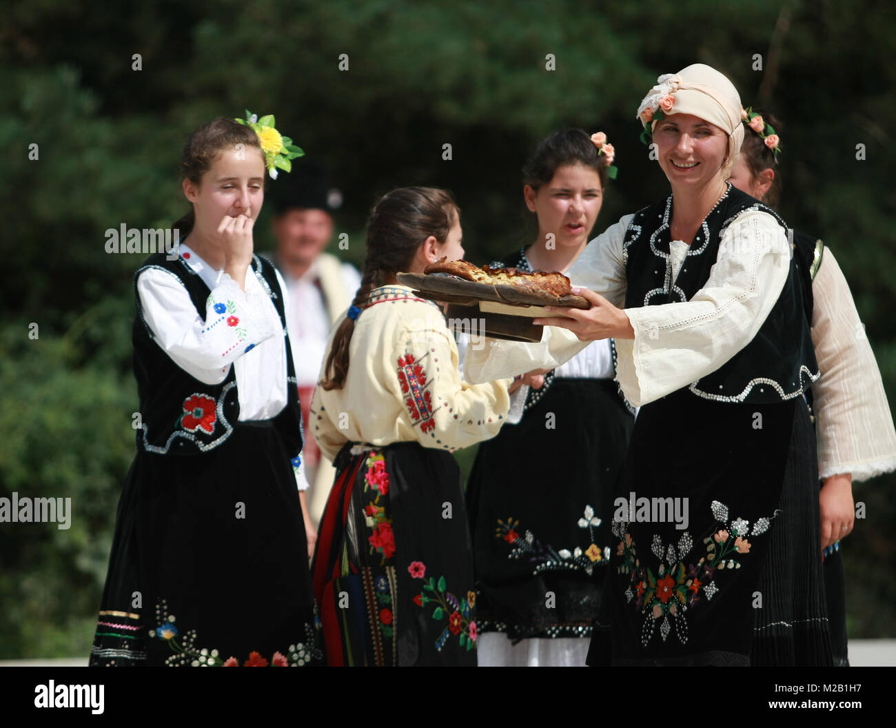 People in traditional folk costume of The National Folklore Fair in ...