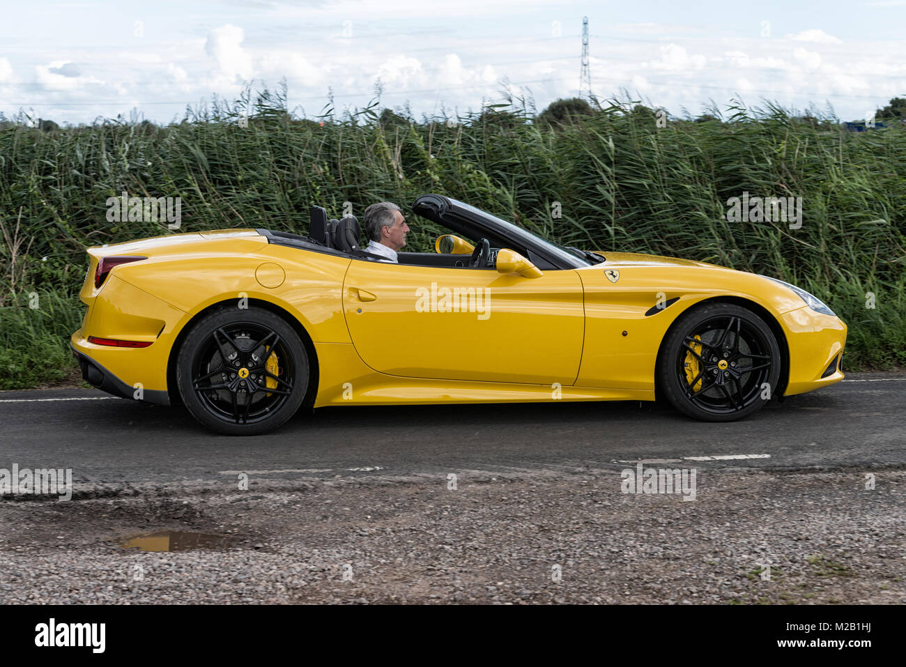 A yellow Ferrari F1 California pictured on The Gwent Levels between ...
