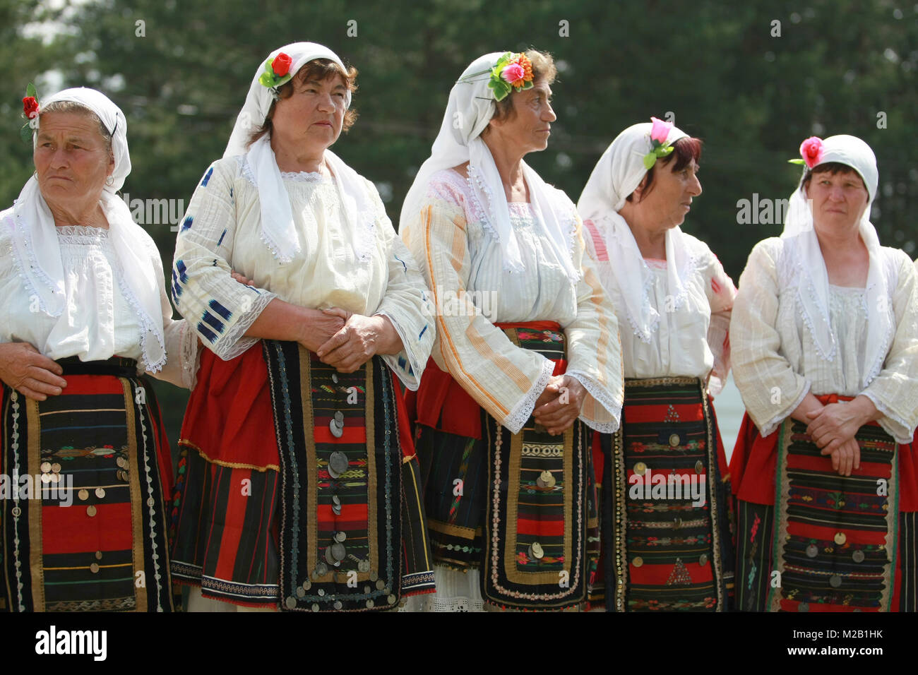 People in traditional folk costume of The National Folklore Fair in ...