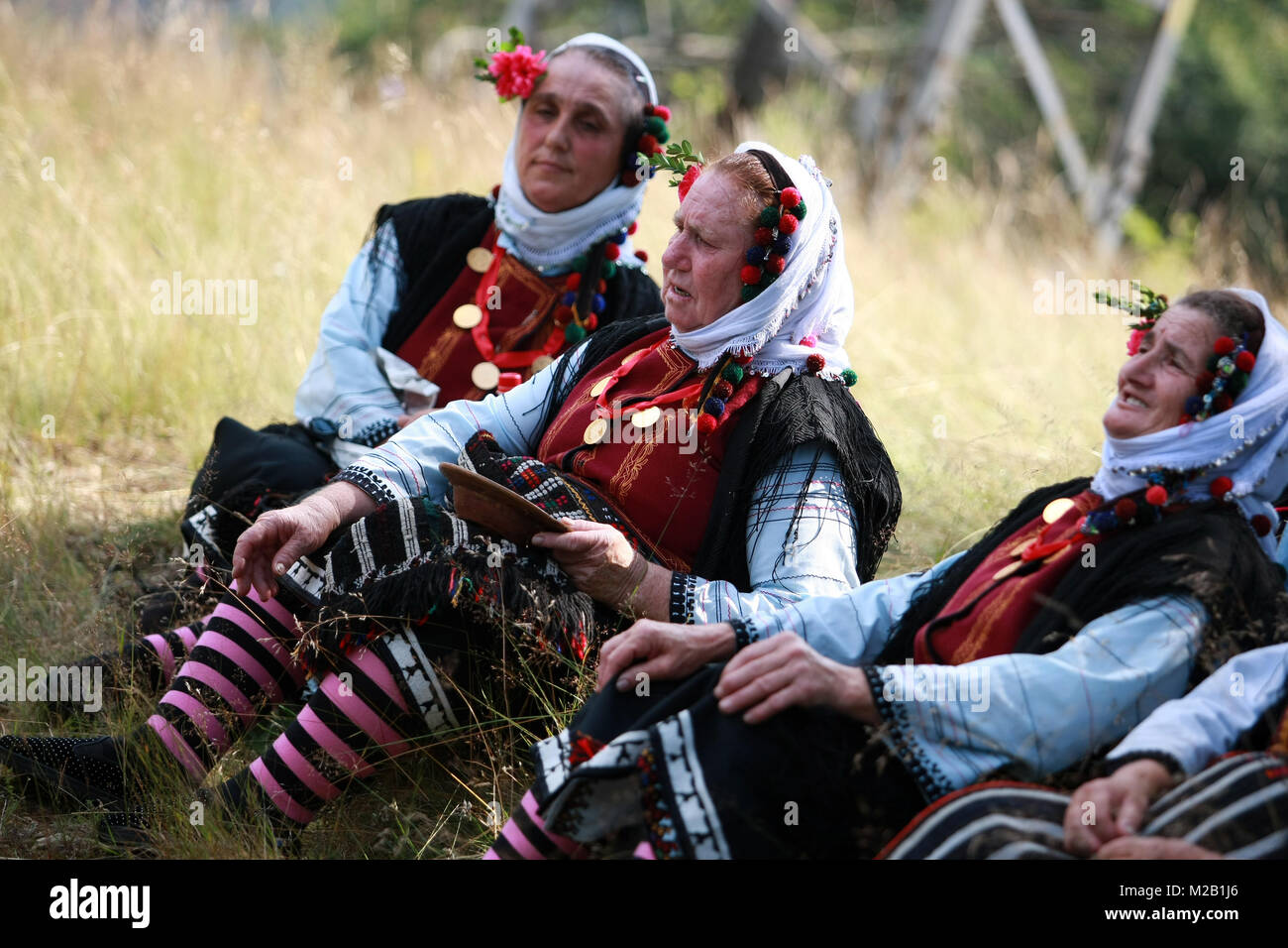 People in traditional folk costume of The National Folklore Fair in ...