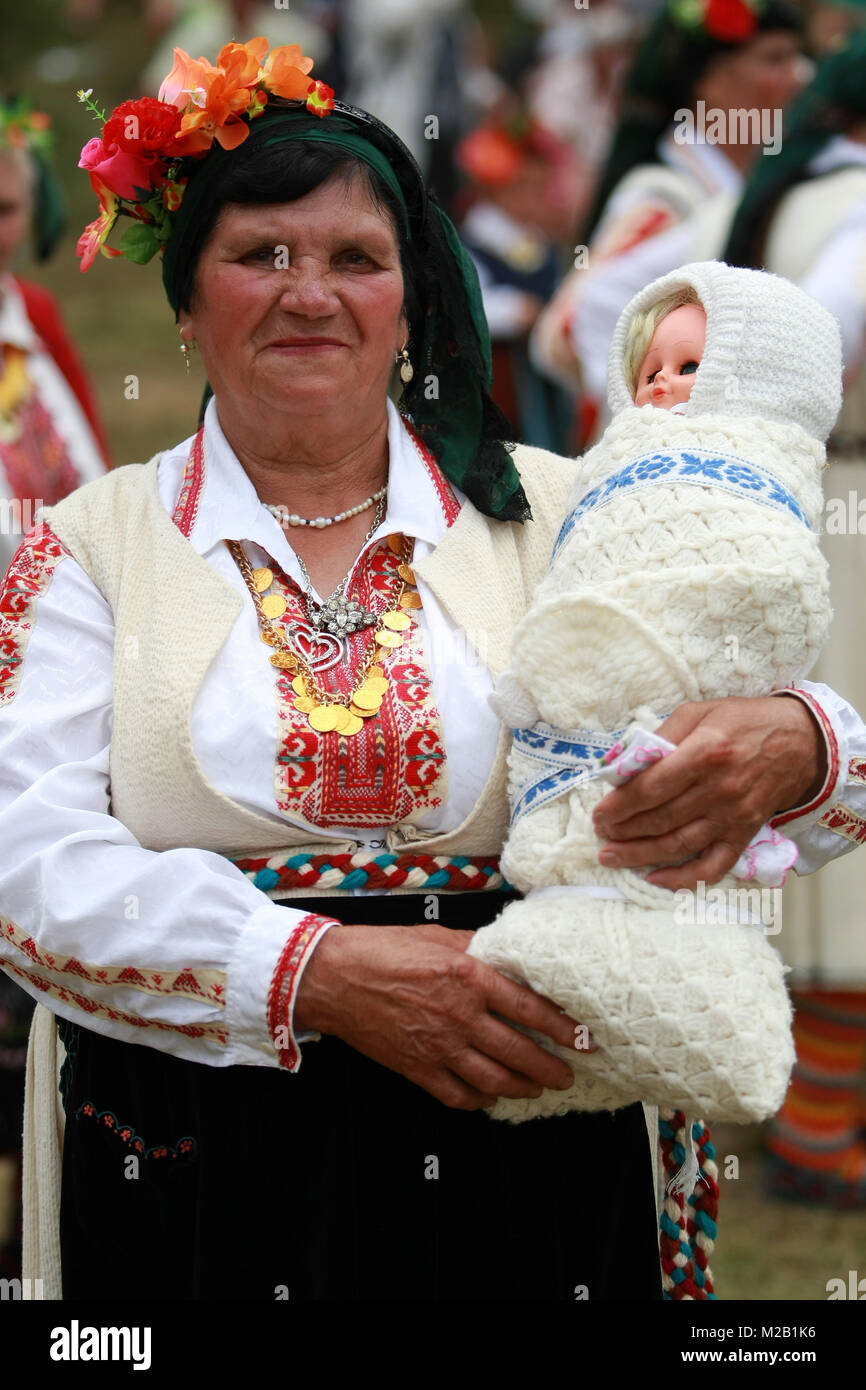 People in traditional folk costume of The National Folklore Fair in ...
