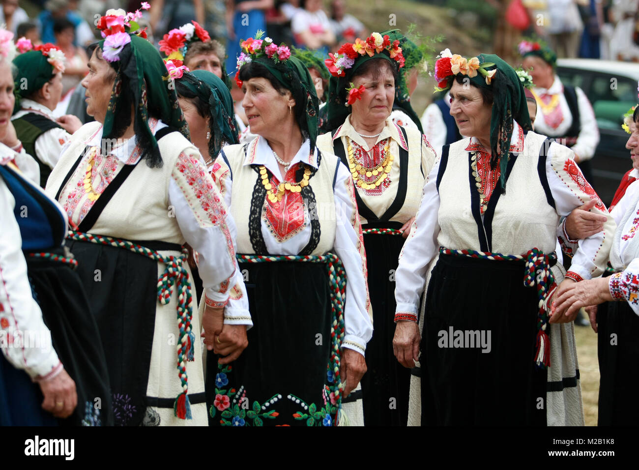 People in traditional folk costume of The National Folklore Fair in ...