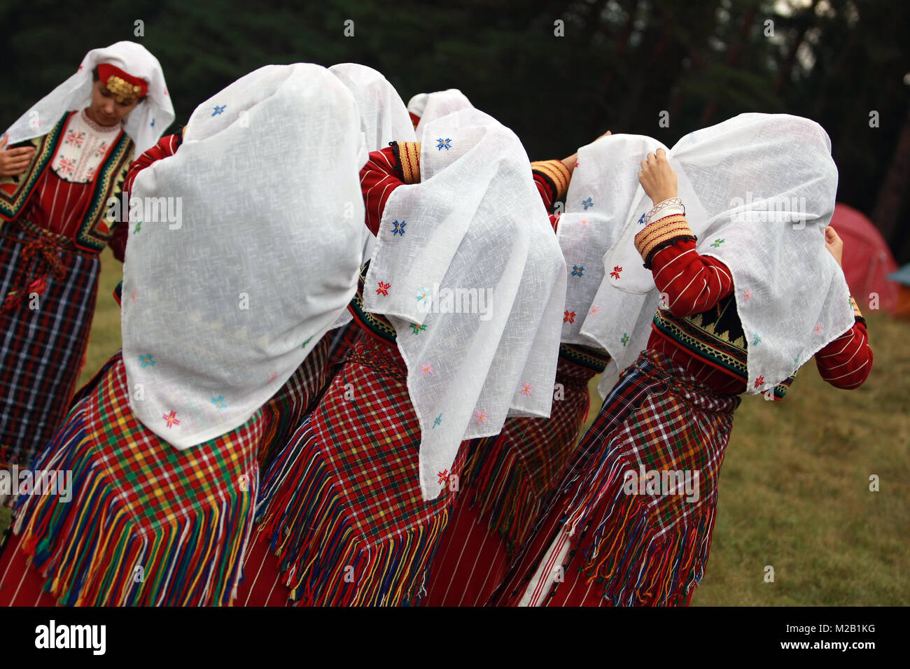 People in traditional folk costume of The National Folklore Fair in ...