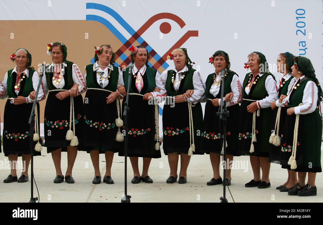 People in traditional folk costume of The National Folklore Fair in ...