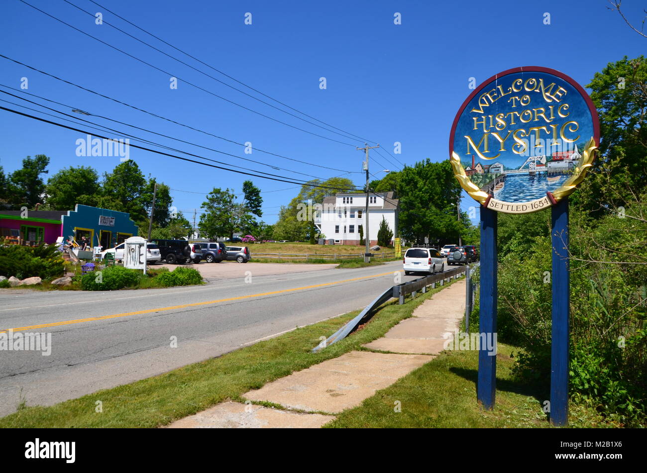 wooden painted welcome to mystic connecticut sign Stock Photo - Alamy