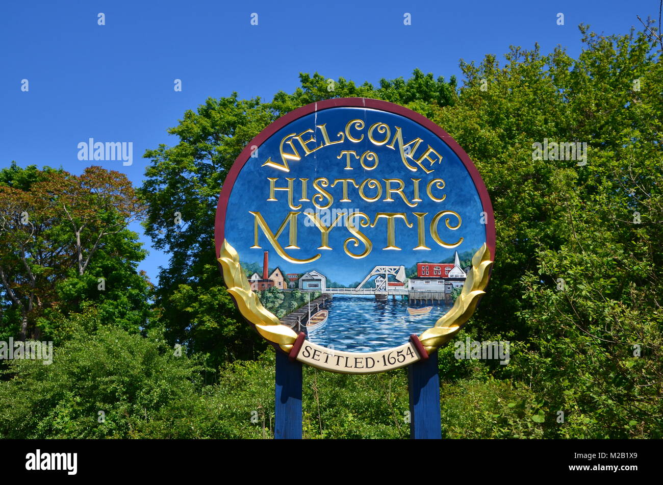 wooden painted welcome to mystic connecticut sign Stock Photo - Alamy