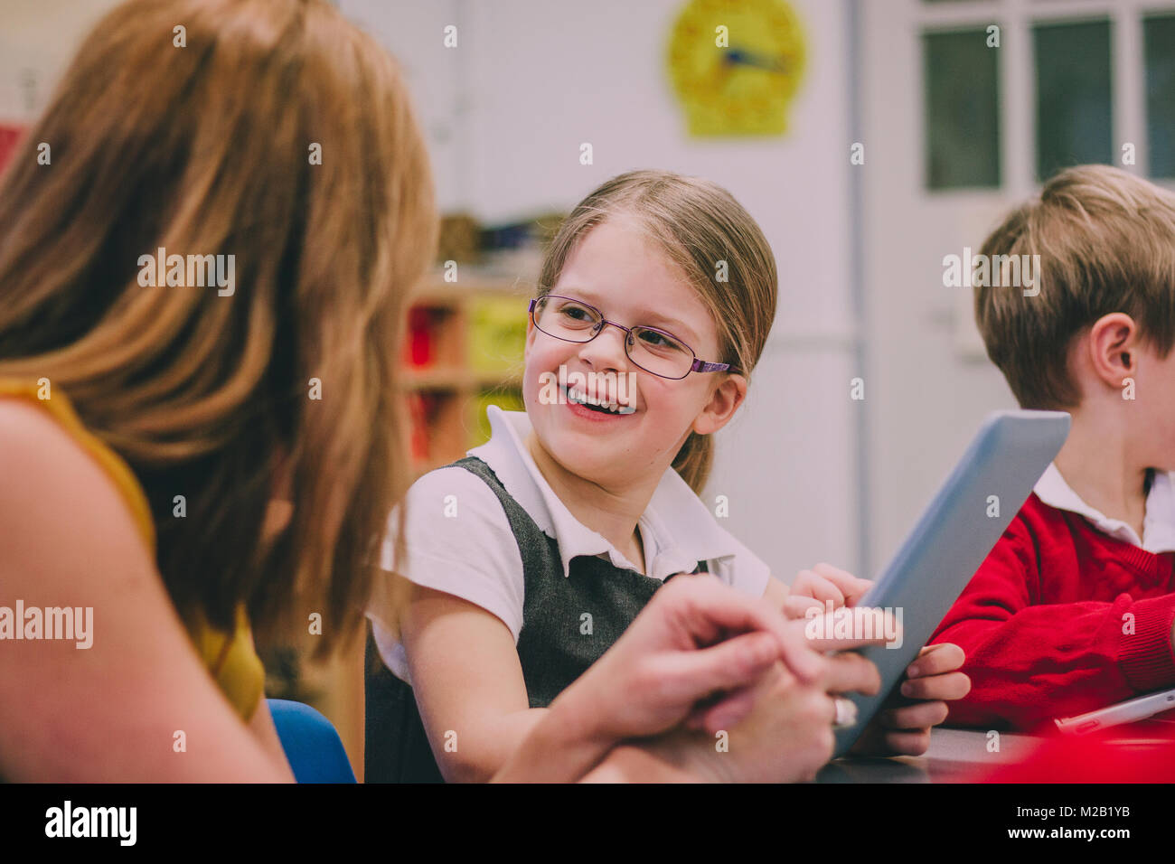 Tablet classroom uniform students hi-res stock photography and images ...